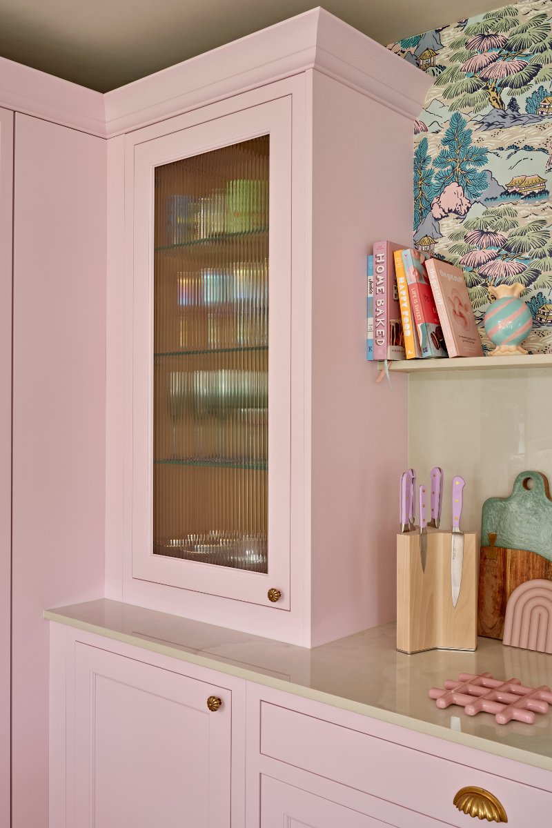 This pink kitchen is a riot of colour and personality