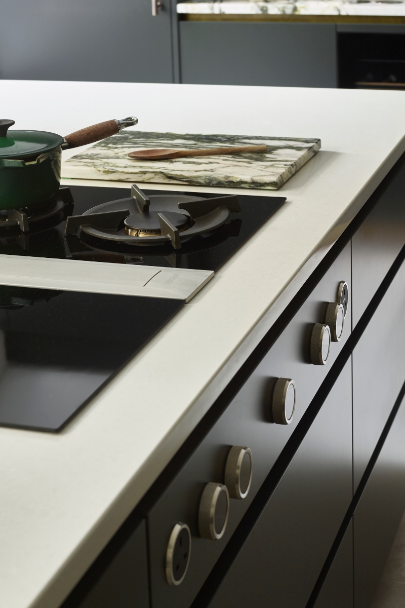 Tour this dark green kitchen with statement Calacatta Verde marble