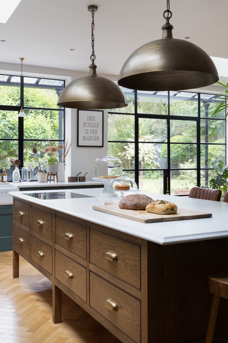 Tour this dark green Shaker kitchen with a secret pantry